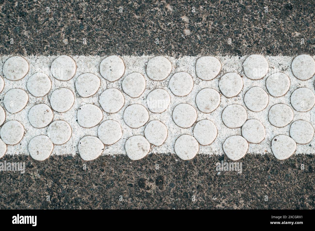 Cold plastic structured stripes with dot pattern for road surface ...