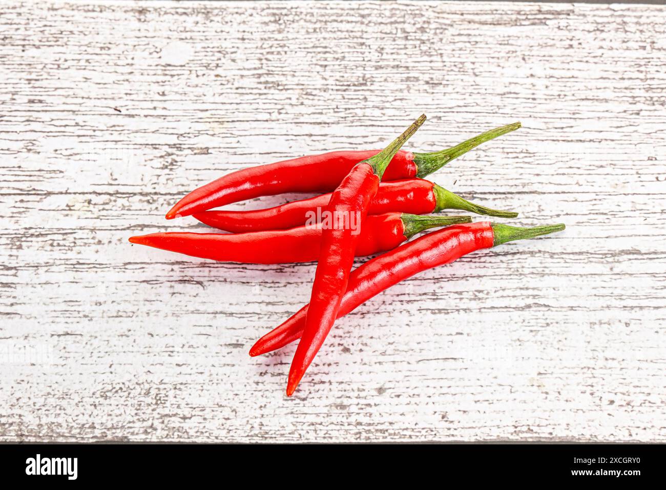Hot and spicy chili pepper heap Stock Photo - Alamy