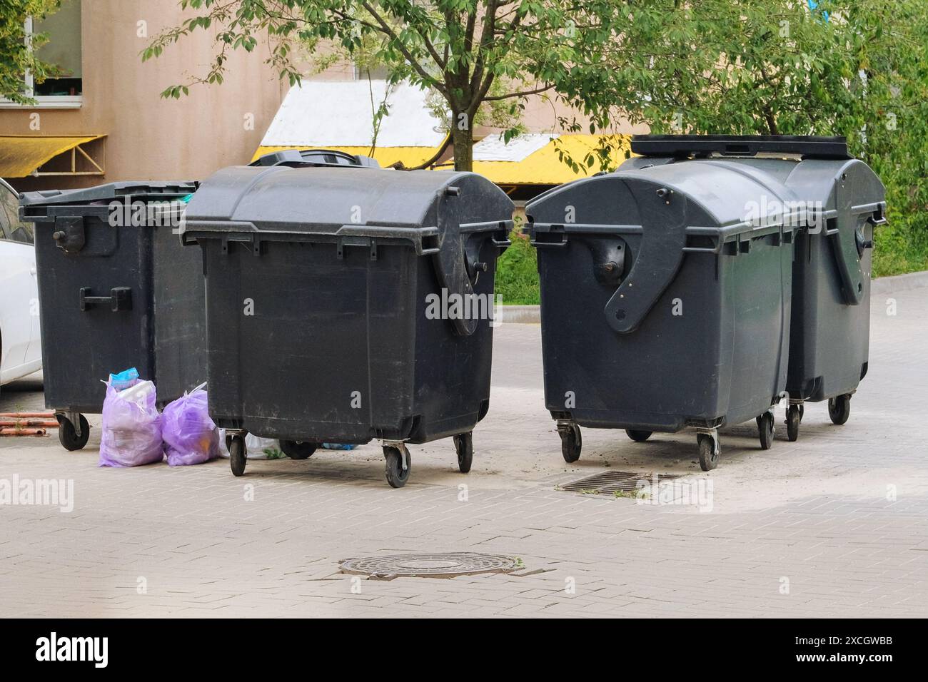 Dumpsters being full with garbage in city. Garbage waste lots junk dump ...