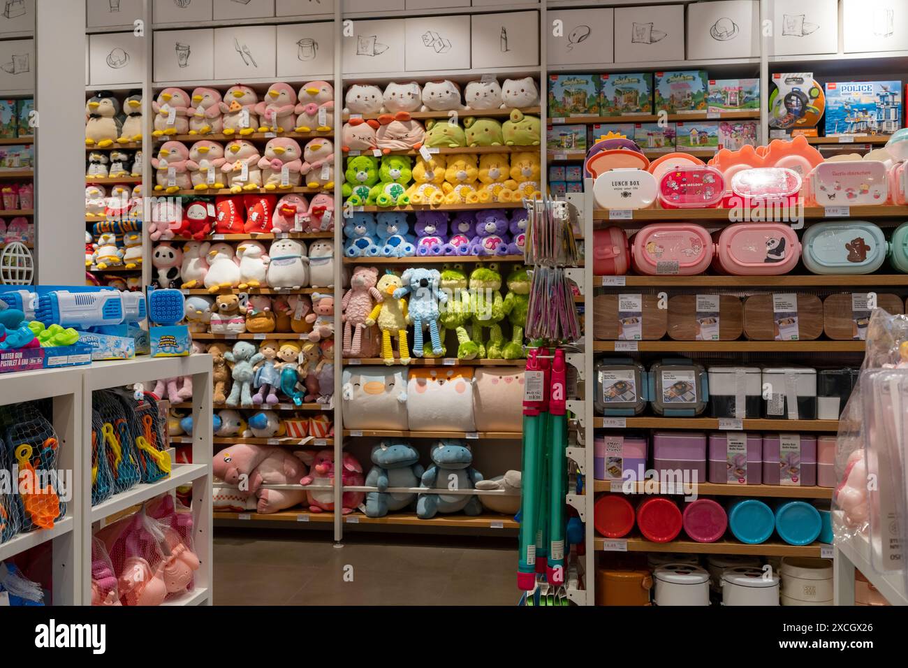 Modern stylish designer goods, accessories, toys on the shelves of the ...