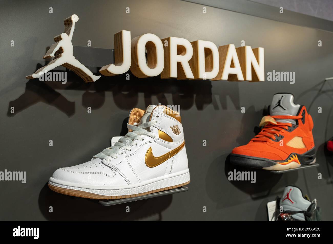 Nike Air Jordan logo and basketball shoes display in the interior of a ...