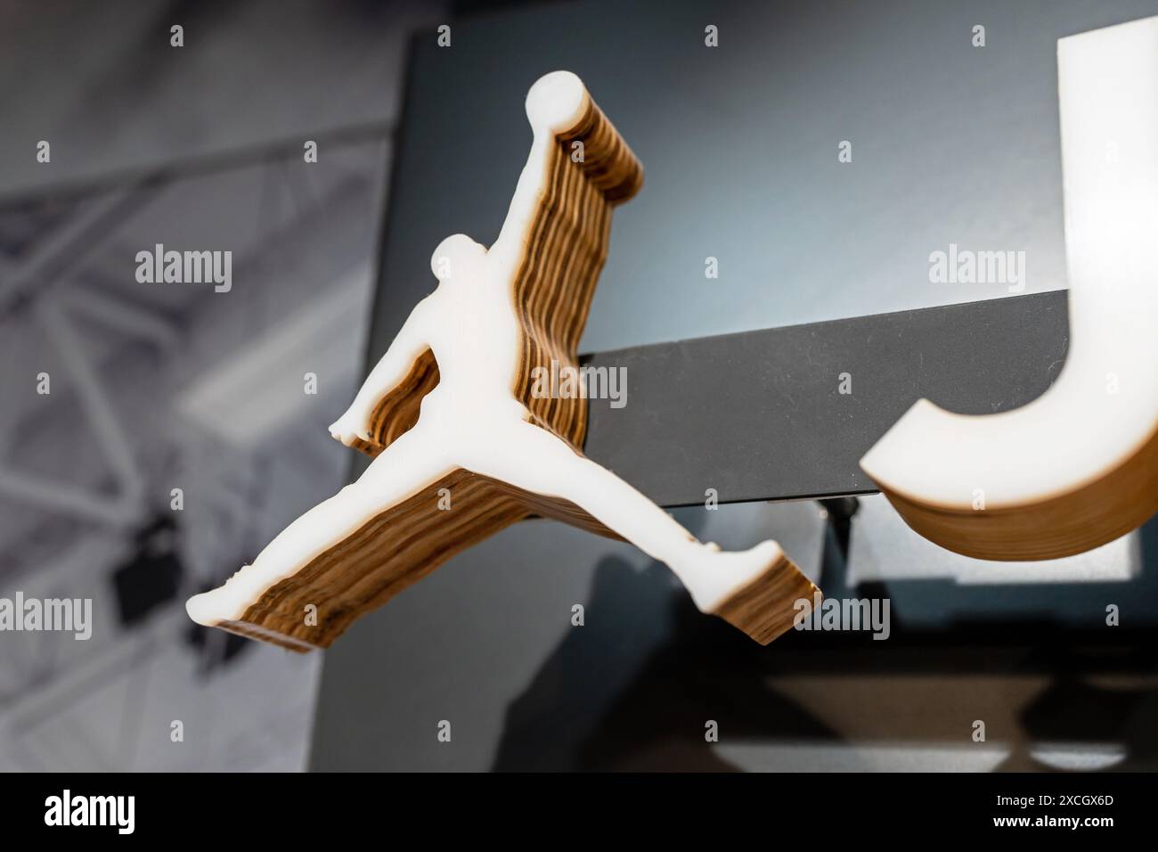 Jordan brand logo on a stand with shoes in a Nike store. Air Jordan is ...