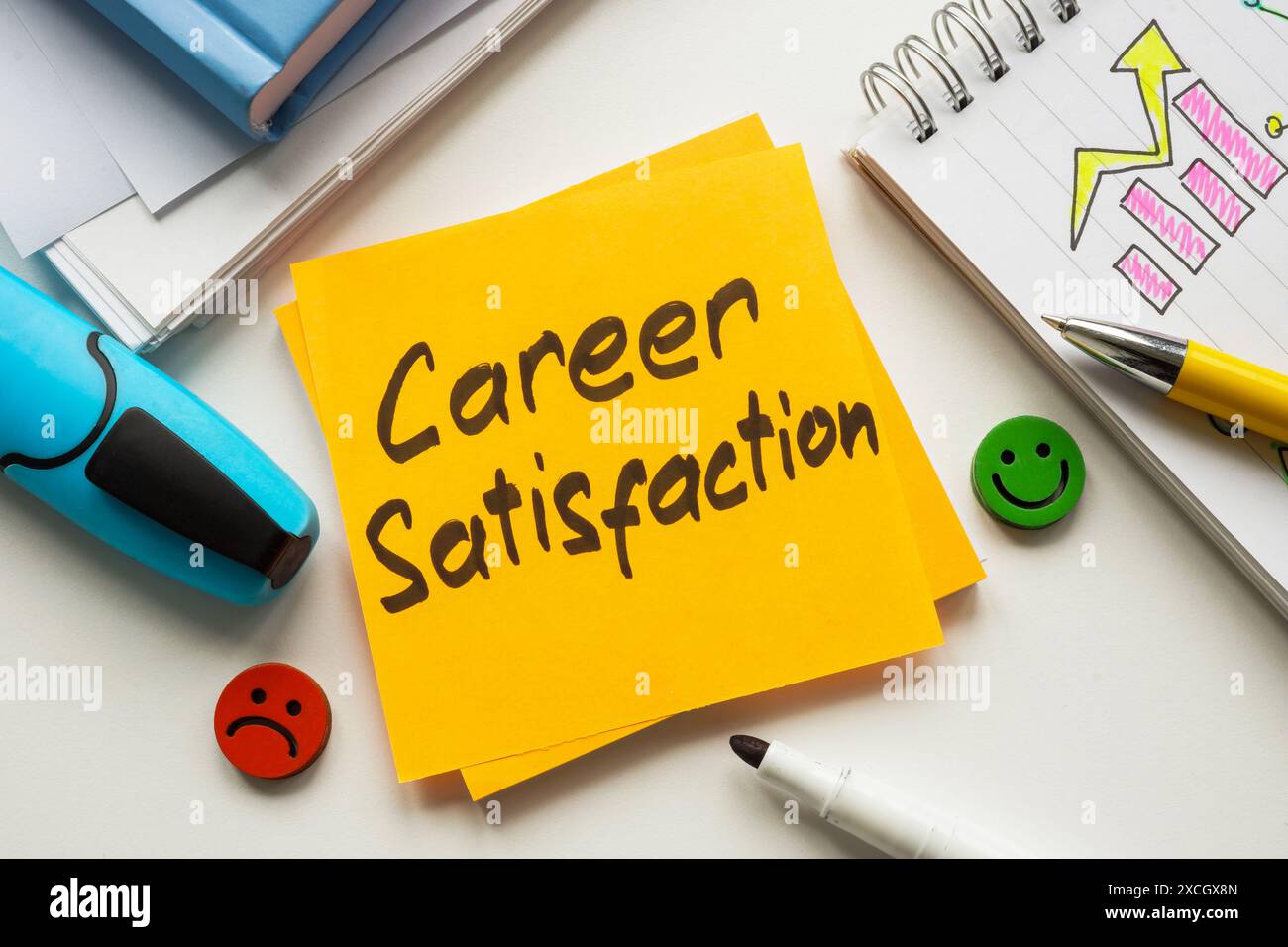 Marks about career satisfaction in the notepad Stock Photo - Alamy
