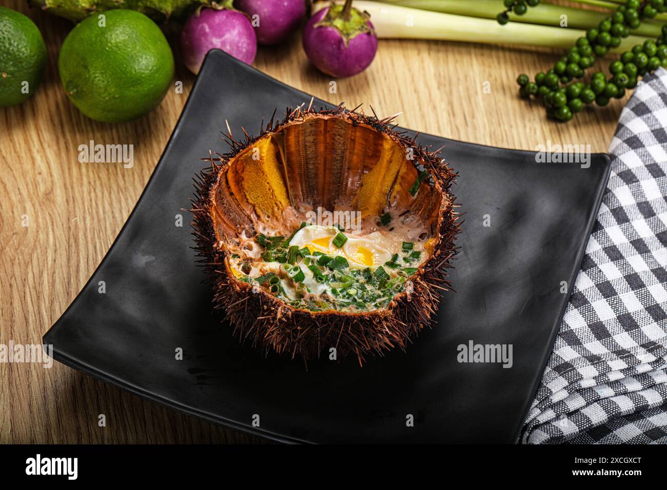 Delicous Grilled Sea Urchin with egg Stock Photo - Alamy