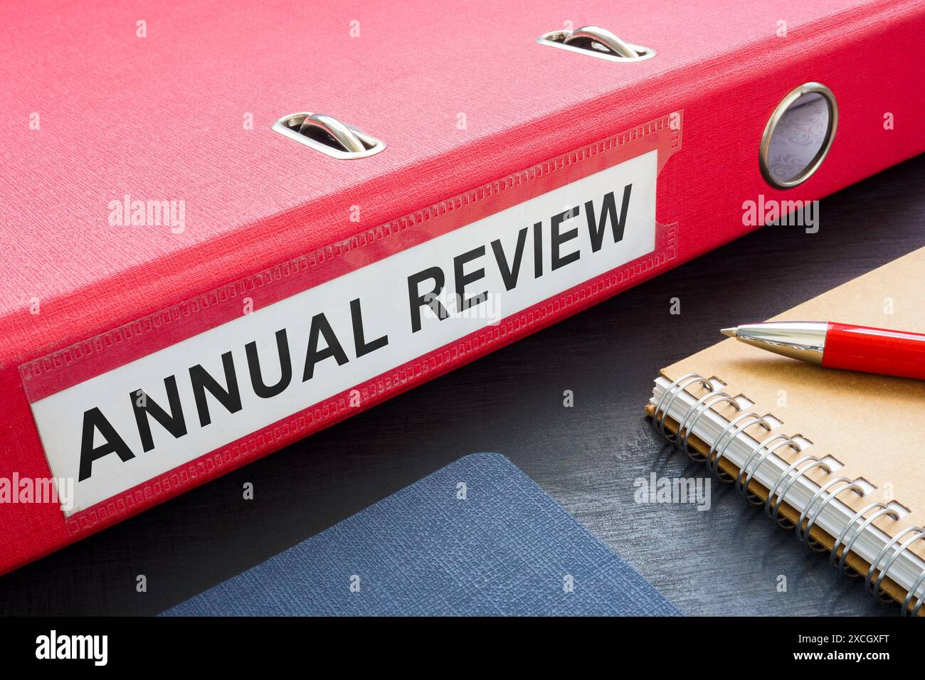 Big folder with annual review and notebooks Stock Photo - Alamy