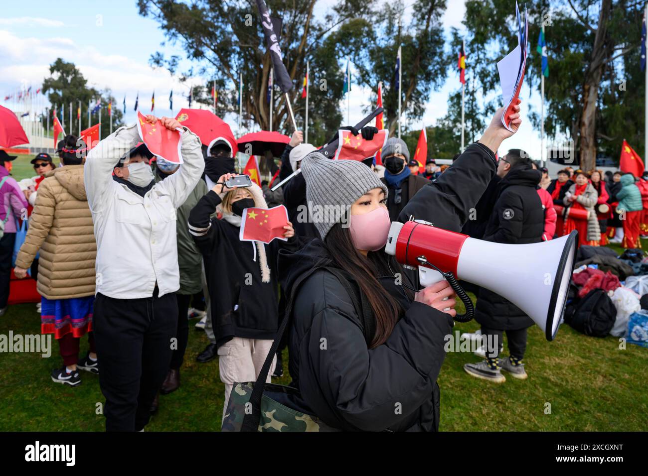 Protesters from the Hong Kong community seen tearing the national flag ...