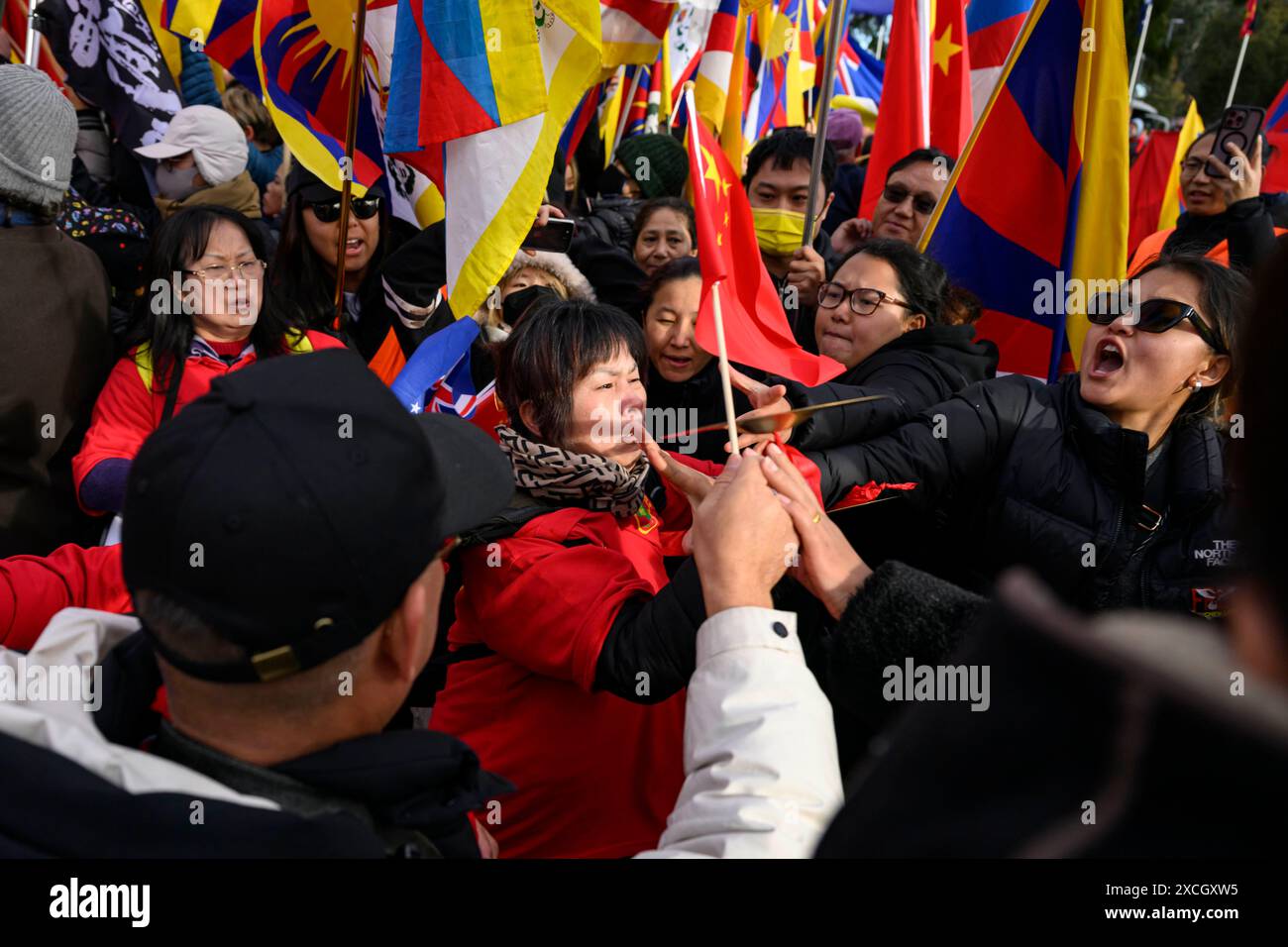 Protesters from the Tibet community seen having a fight with the ...