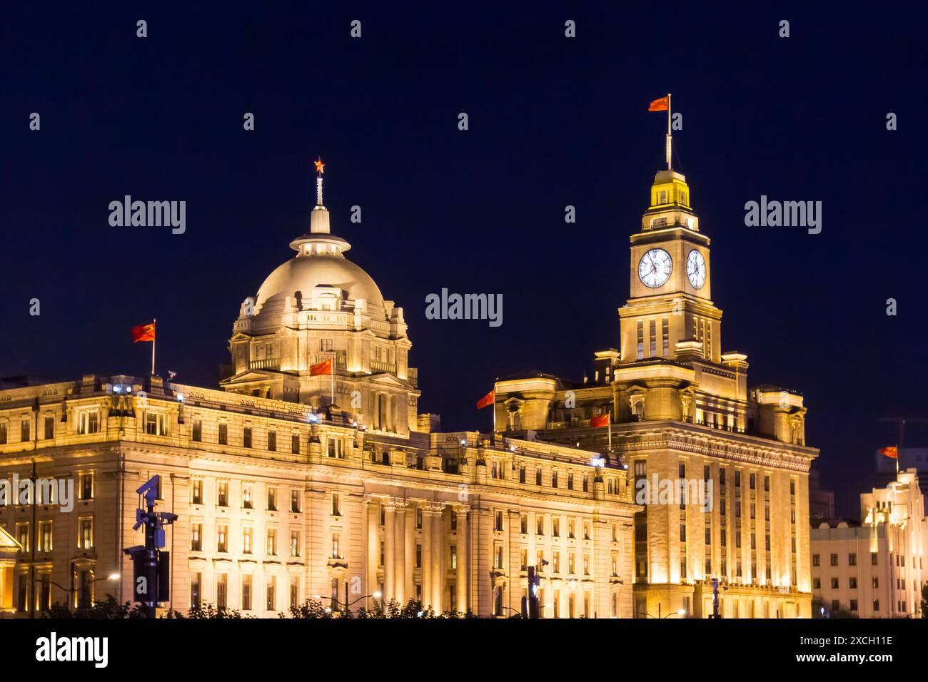 Blue hour over the illuminated bank and custom buildings in Shanghai ...