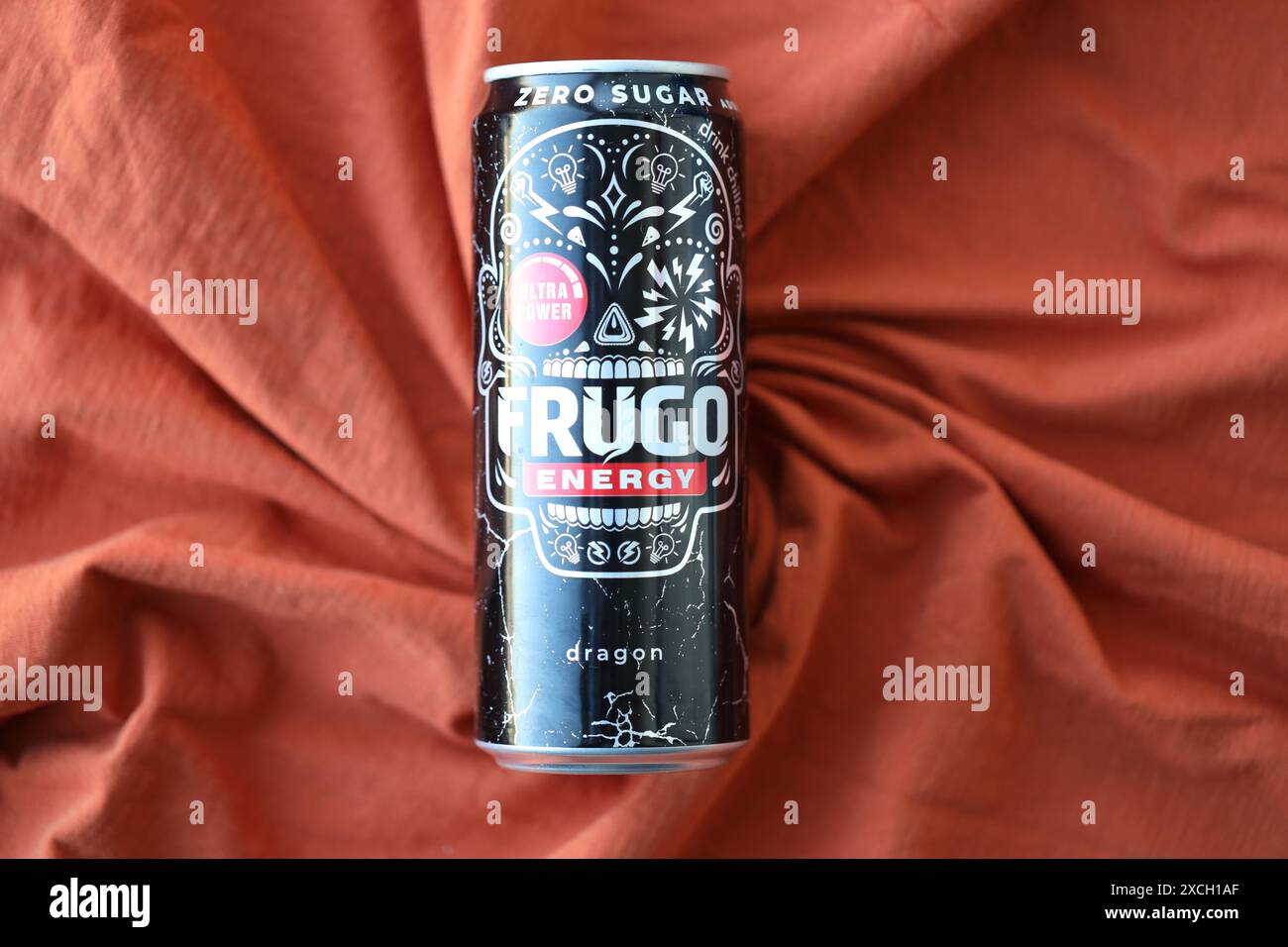 KYIV, UKRAINE - APRIL 20, 2024 Frugo energy drink in black tin can on ...