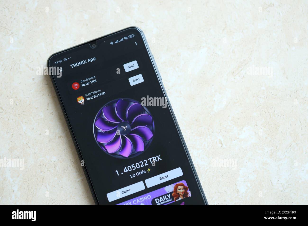KYIV, UKRAINE - APRIL 20, 2024 Tronix App telegram bot on smartphone ...