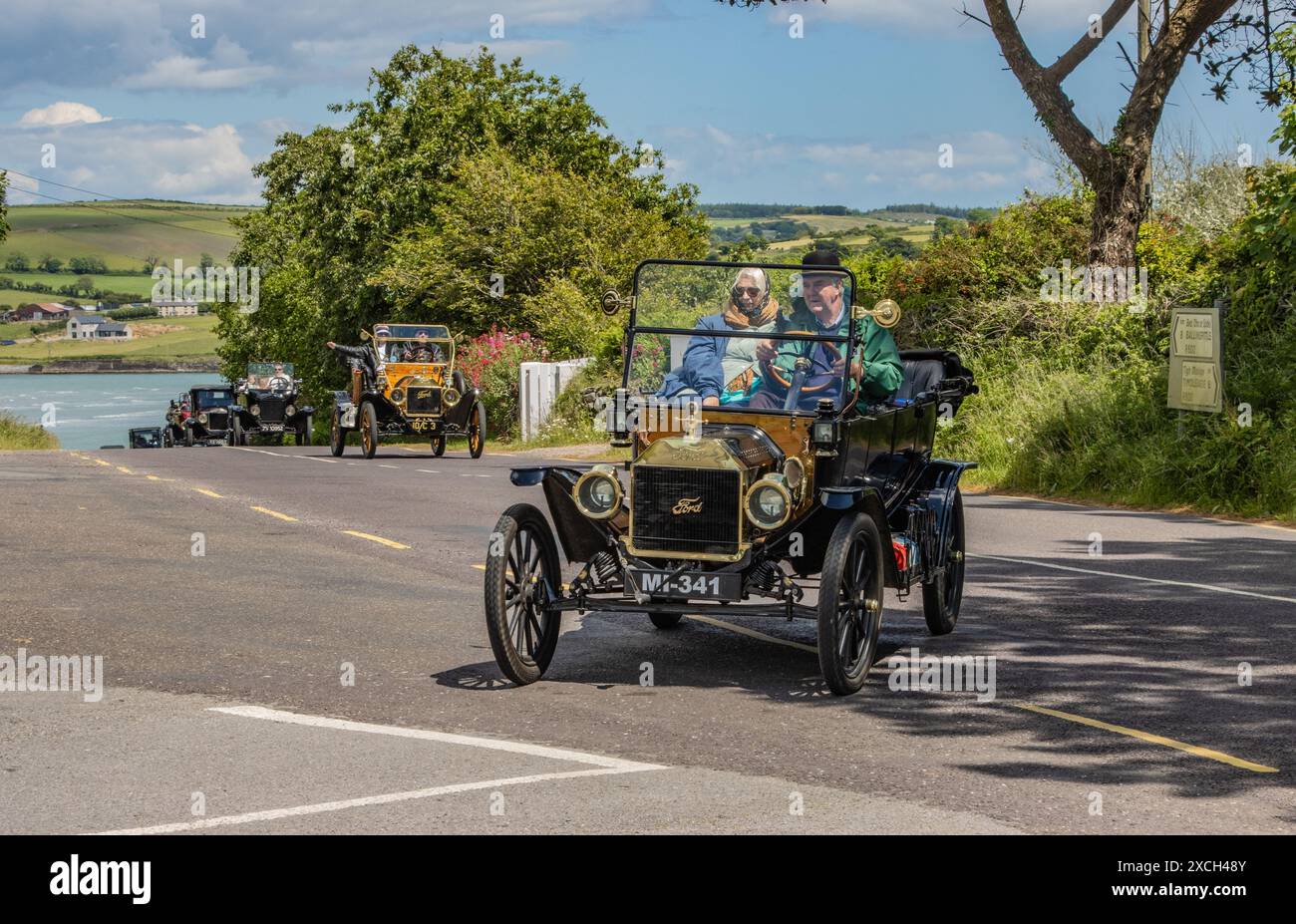 Irish Model T cars on a road run near Kilbrittain, Co. Cork, June 2024 ...