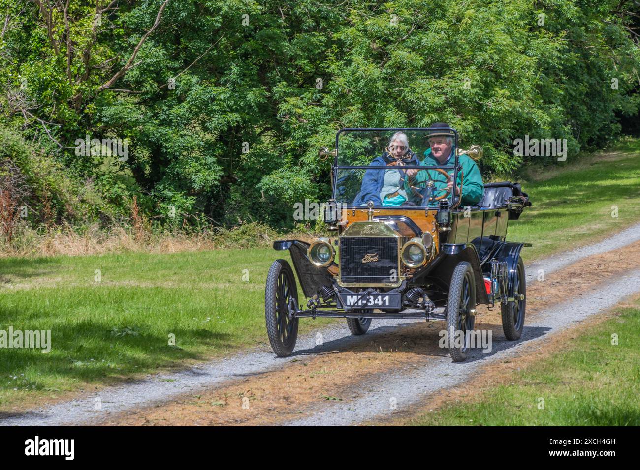 Irish Model T cars on a road run near Kilbrittain, Co. Cork, June 2024 ...