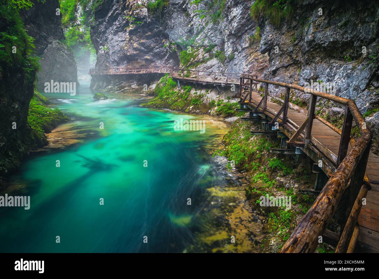 Touristic wooden footbridge in the Vintgar gorge. Great scenery with ...