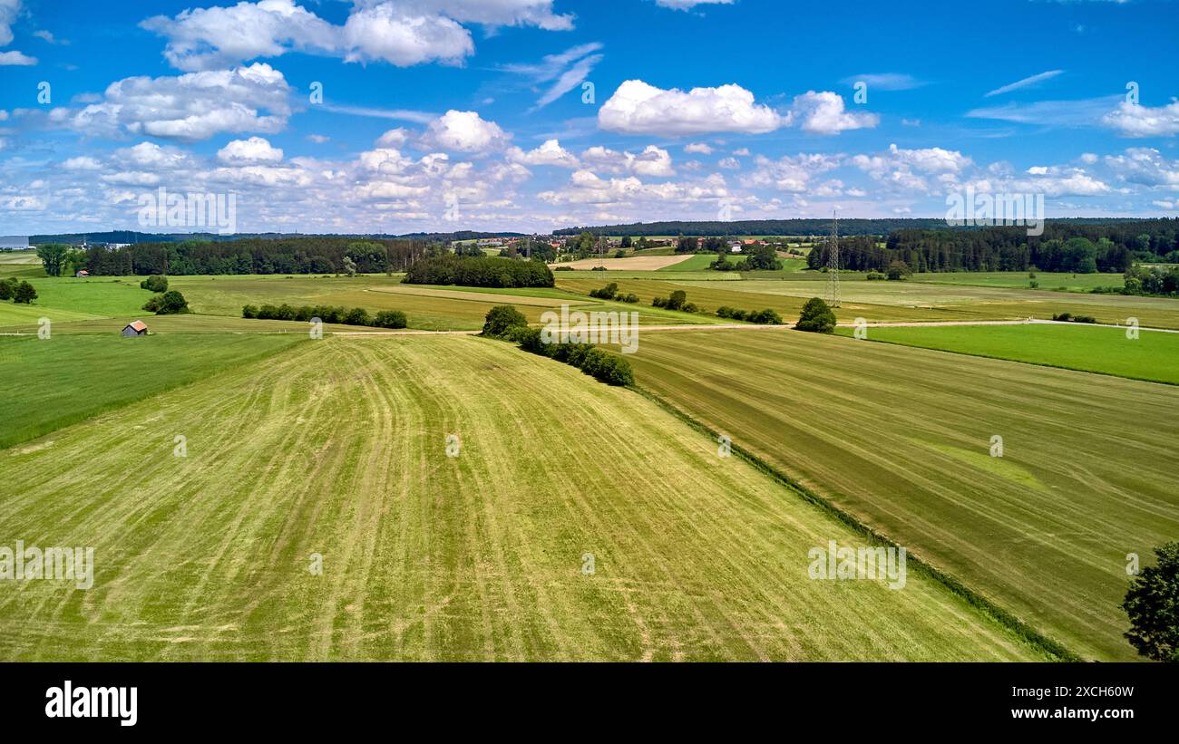 Kammlach, Bavaria, Germany - June 16, 2024: Aerial view of green fields ...