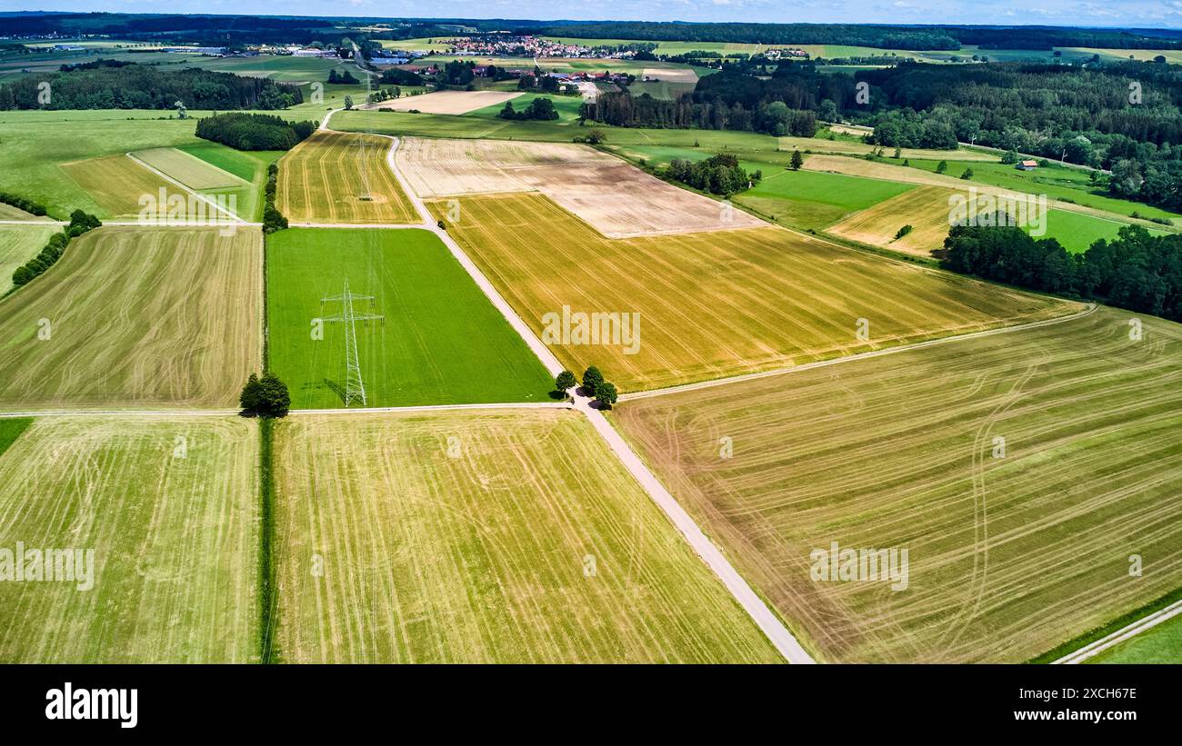 Kammlach, Bavaria, Germany - June 16, 2024: Aerial view of green fields ...