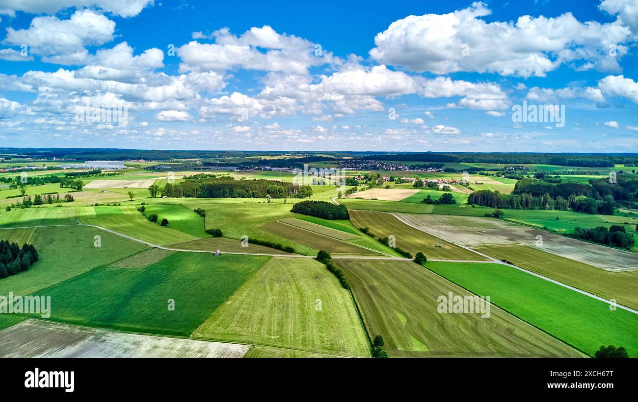 Kammlach, Bavaria, Germany - June 16, 2024: Aerial view of green fields ...