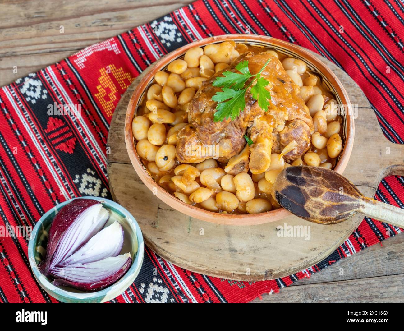 romanian traditional food, beans with boiled pork chop Stock Photo - Alamy