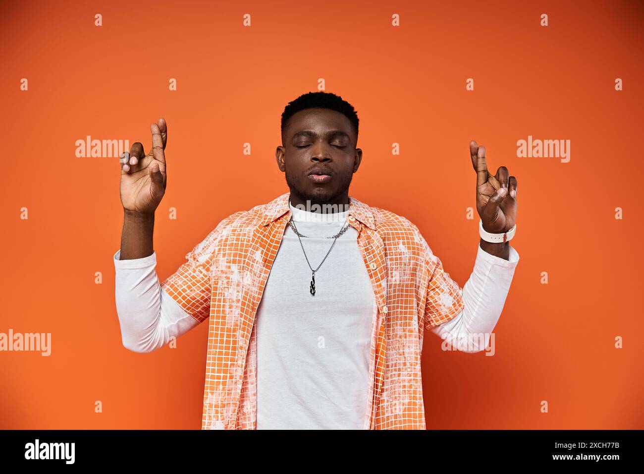 Young handsome african man presenting hi-res stock photography and ...