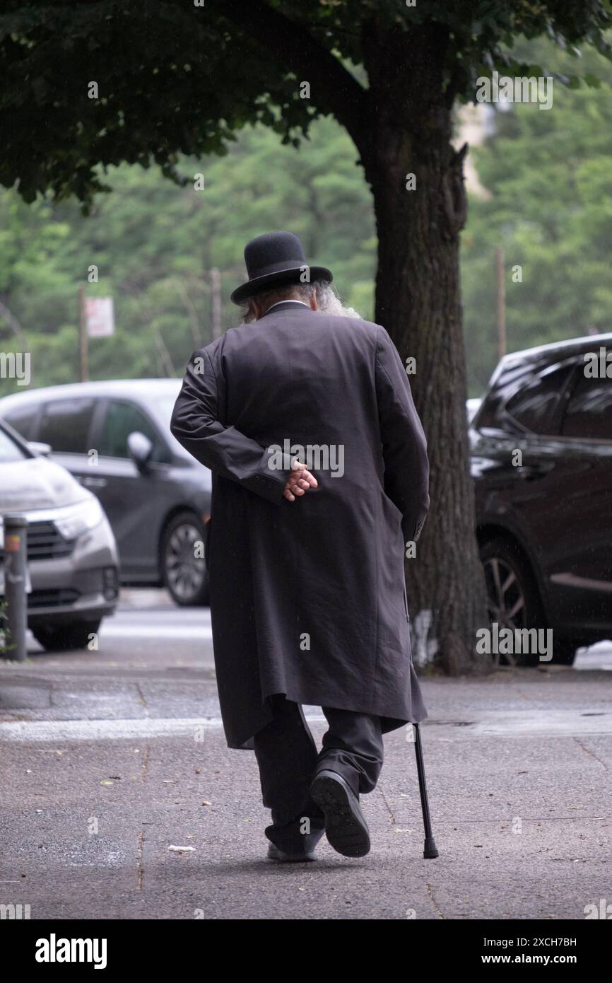 A generic photo of an senior Hasidic Jewish man dressed in black and ...