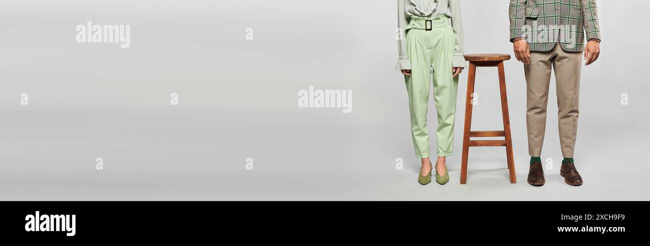 Loving couple standing on stool, pose gracefully Stock Photo - Alamy