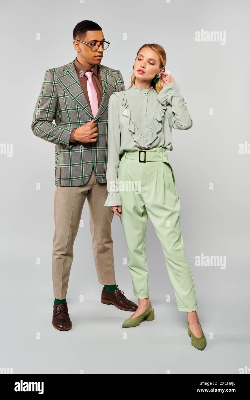 Couple strikes a pose in a loving embrace Stock Photo - Alamy