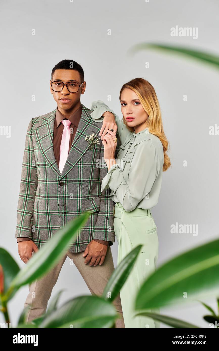 A man and woman striking a pose in a loving manner Stock Photo - Alamy