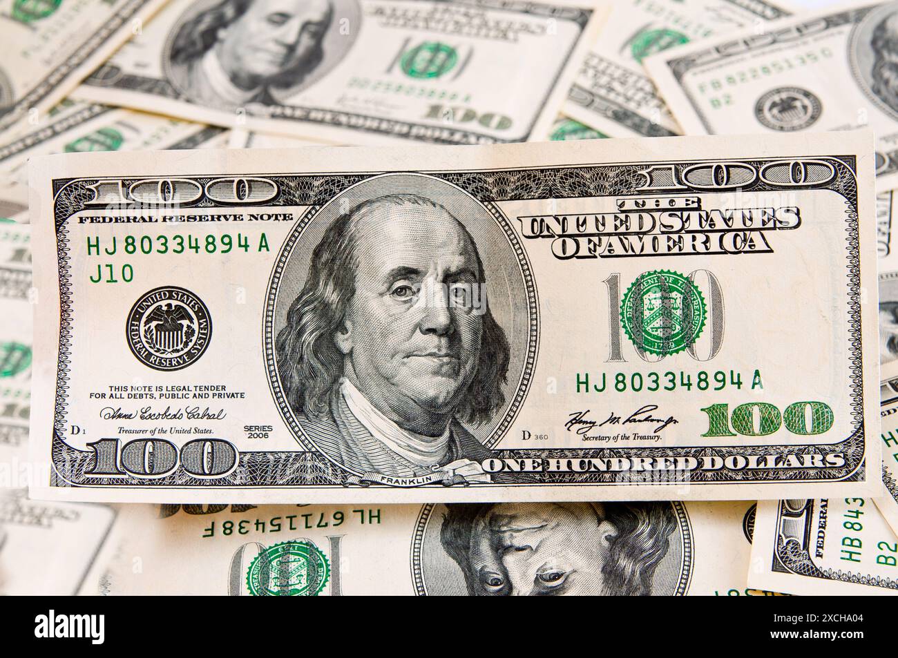 cash american dollars lie on dollars background Stock Photo - Alamy