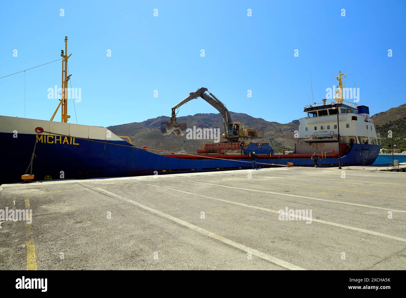 Ship delivering aggregates, Livadia, Tilos, Dodecanese Islands ...