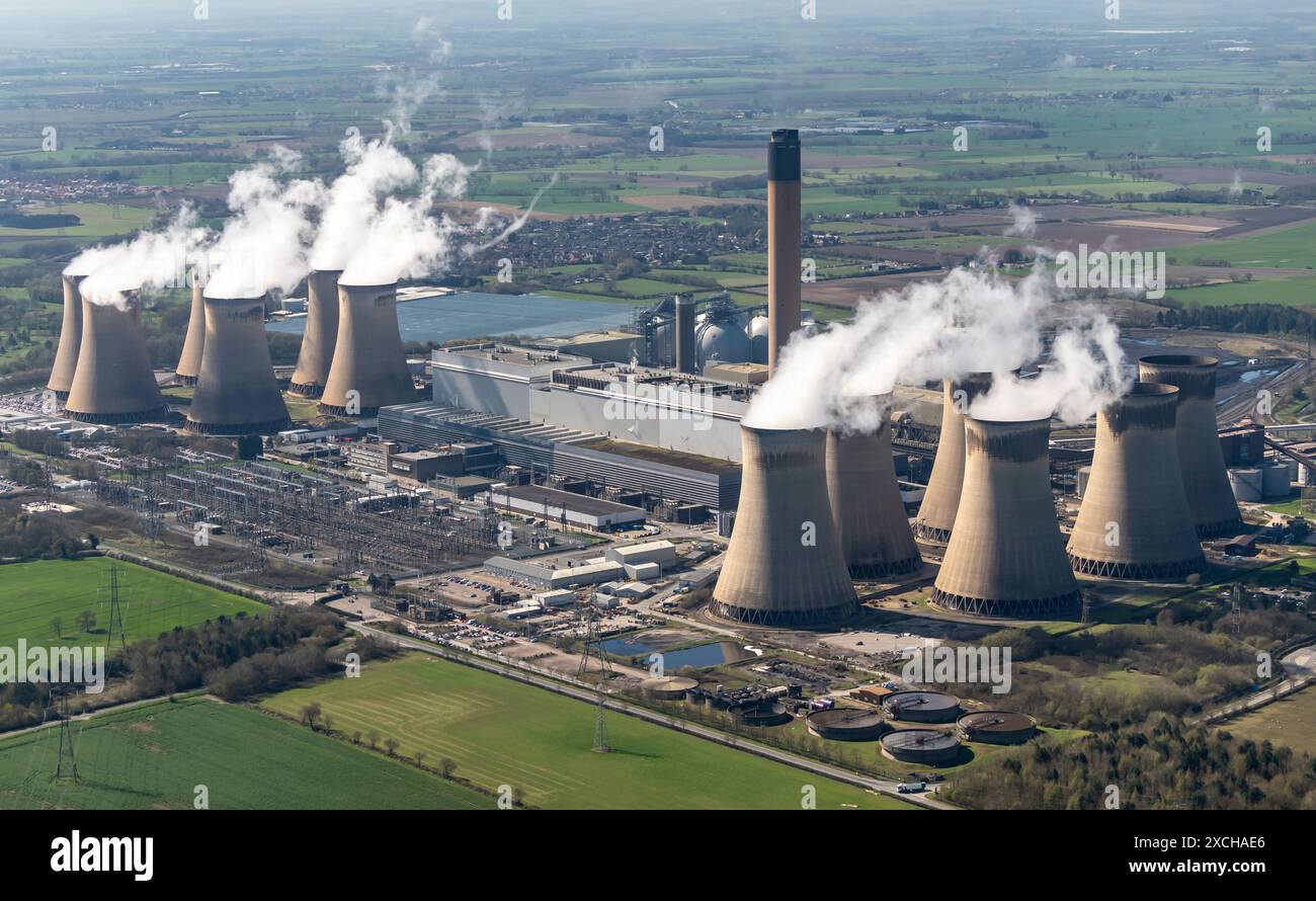 Aerial photo of Drax Power Station with cooling towers billowing steam ...