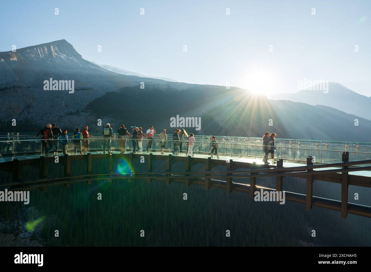 Columbia Icefield Skywalk. Tourists standing on glass floored ...