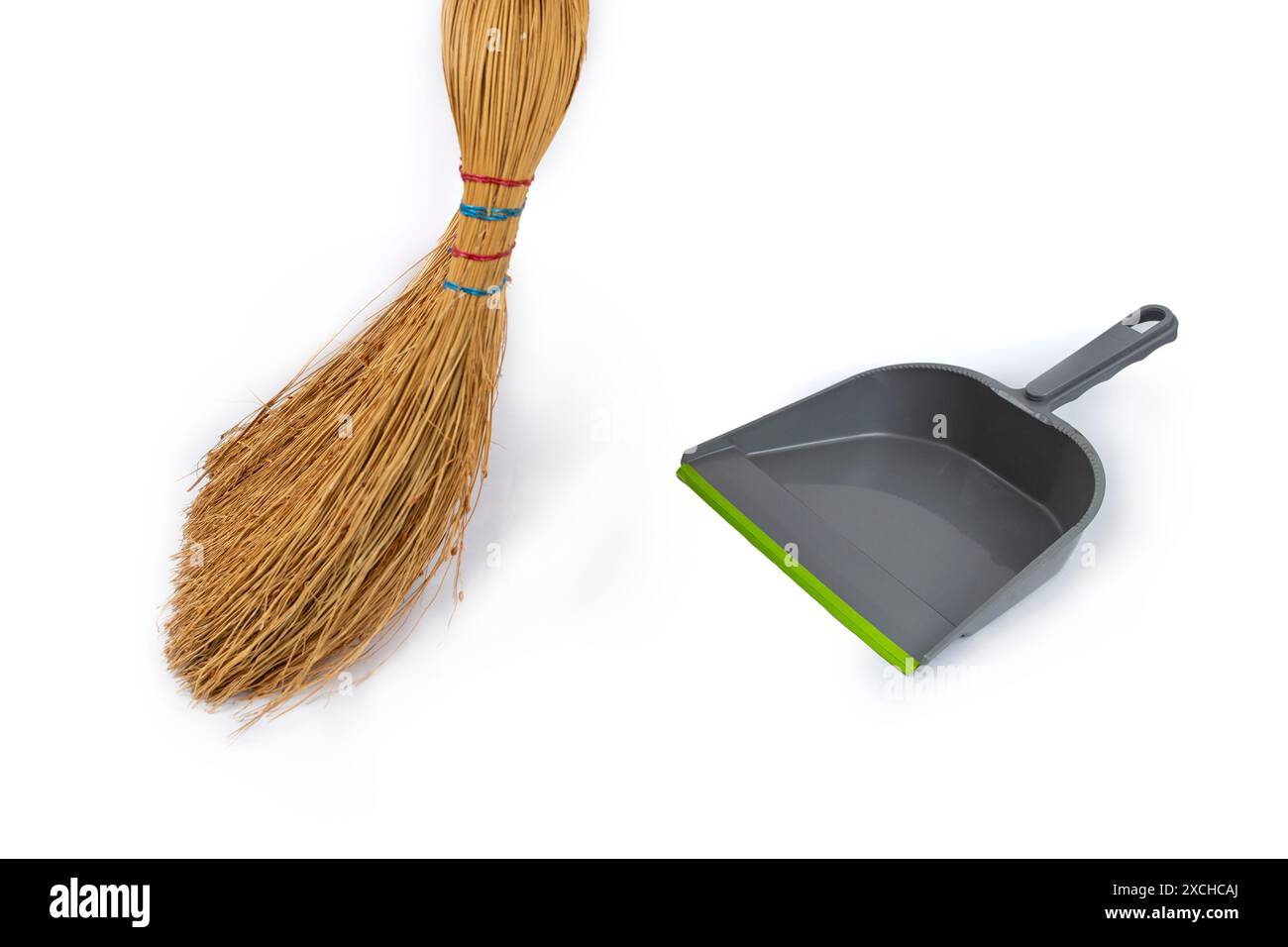 Straws broom bent and gray plastic dust pan , isolated on white ...