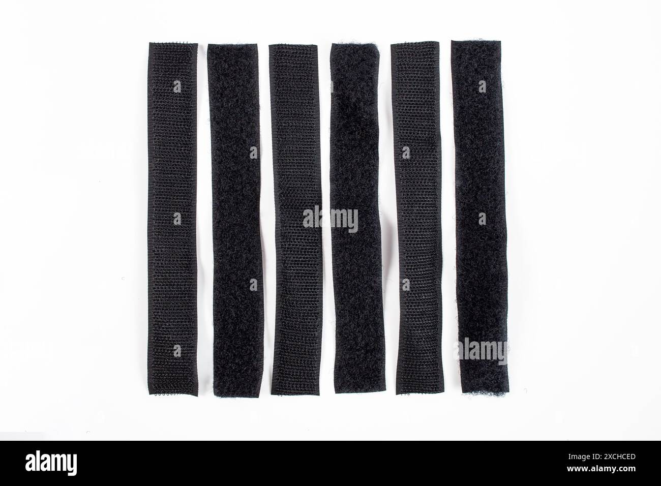 Velcro sticky tape strips pairs isolated on white background, flat lay ...