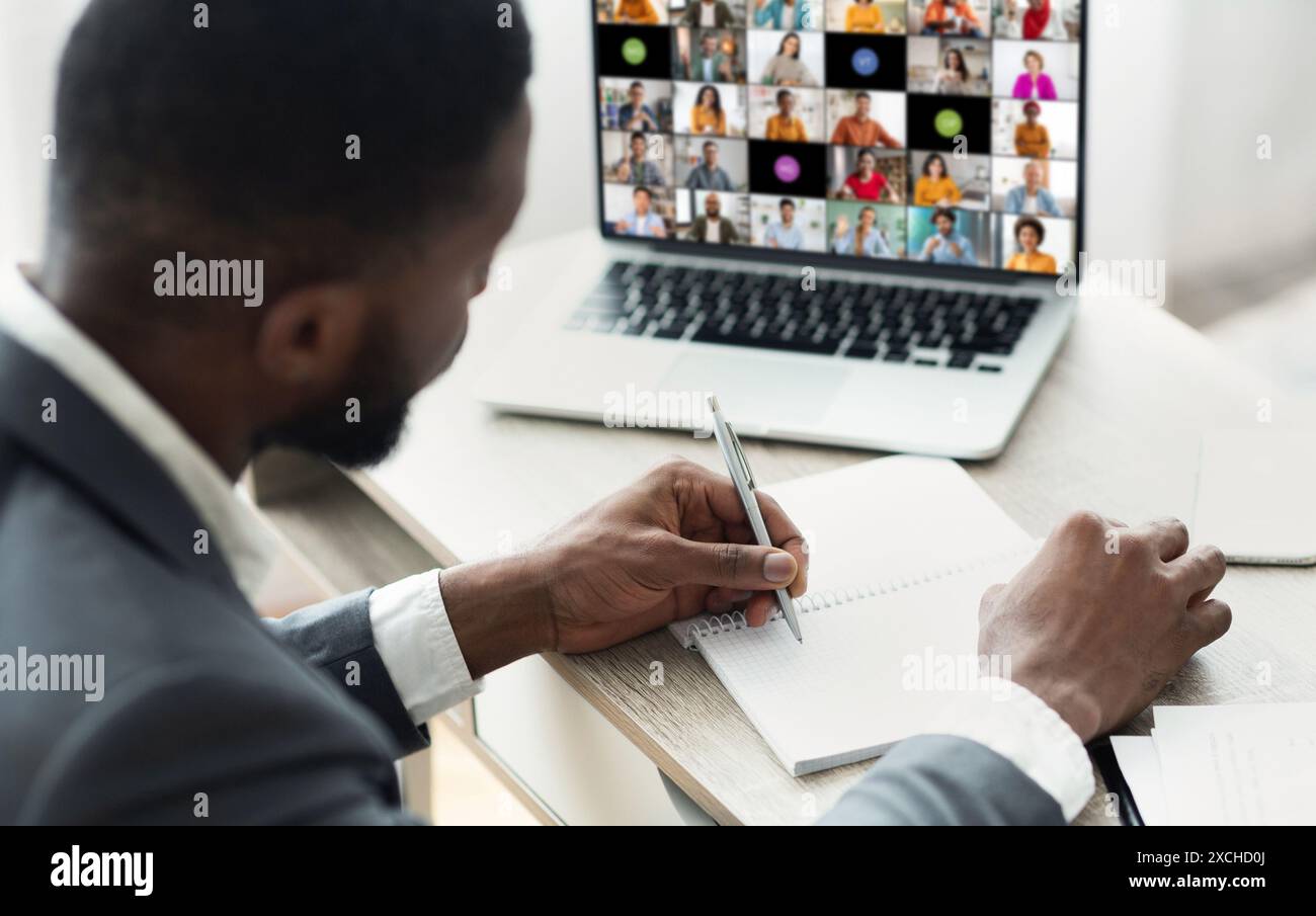 Taking notes during virtual meeting hi-res stock photography and images ...