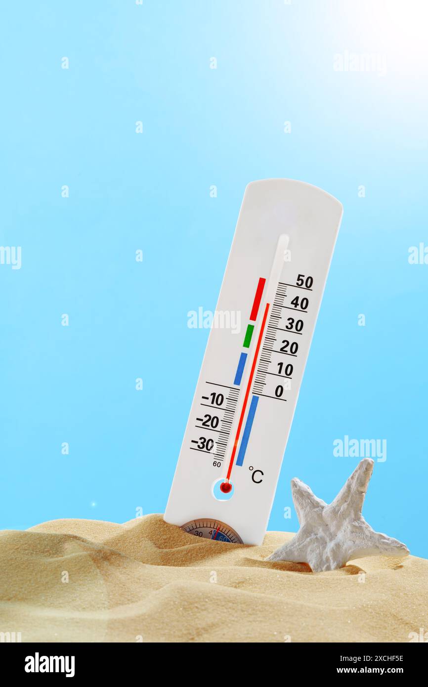 Thermometer Measuring Summer Heat in Sand Stock Photo - Alamy