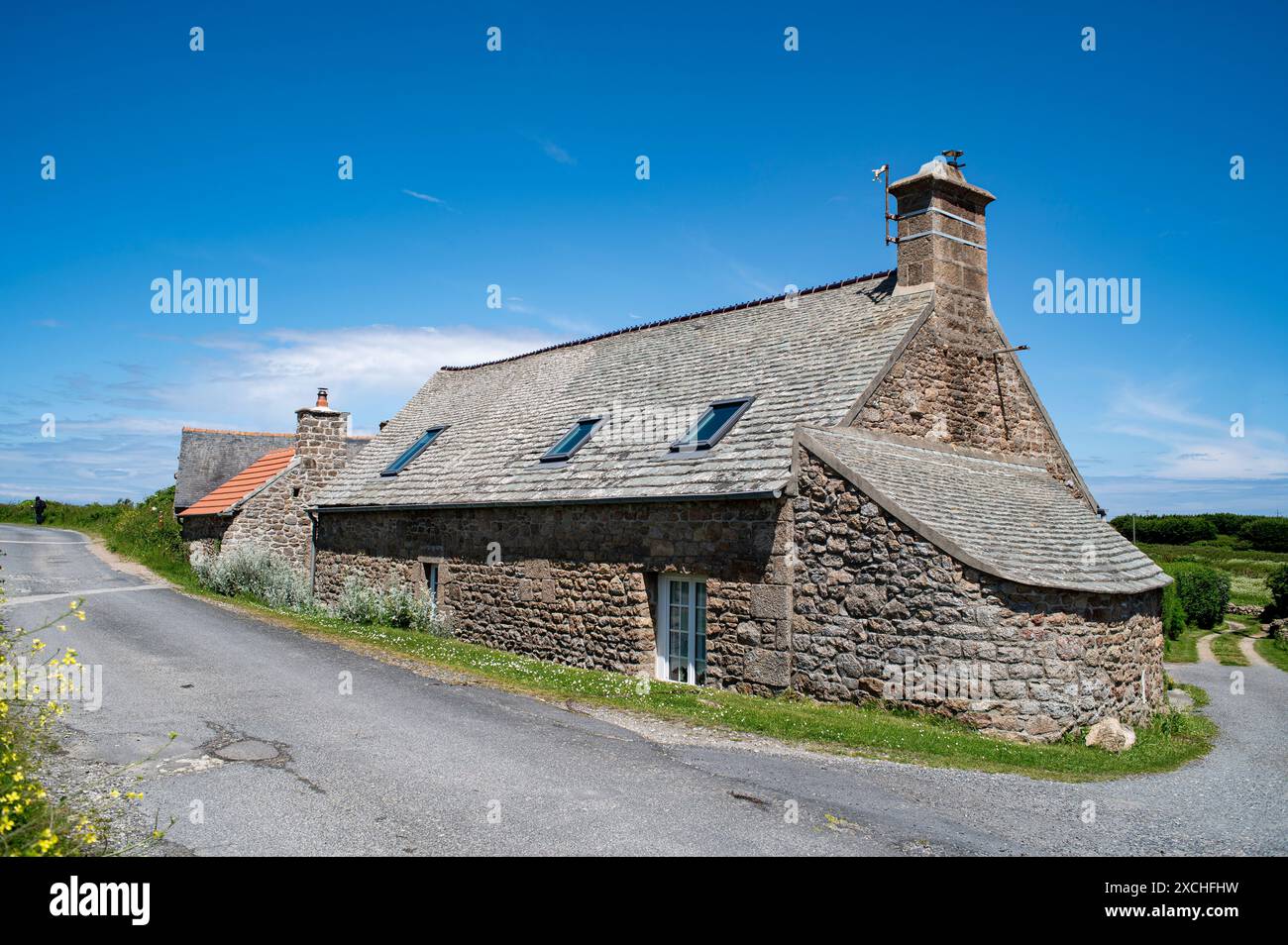 Norman house on the side of a road to Cape Levi in the Cherbourg region ...