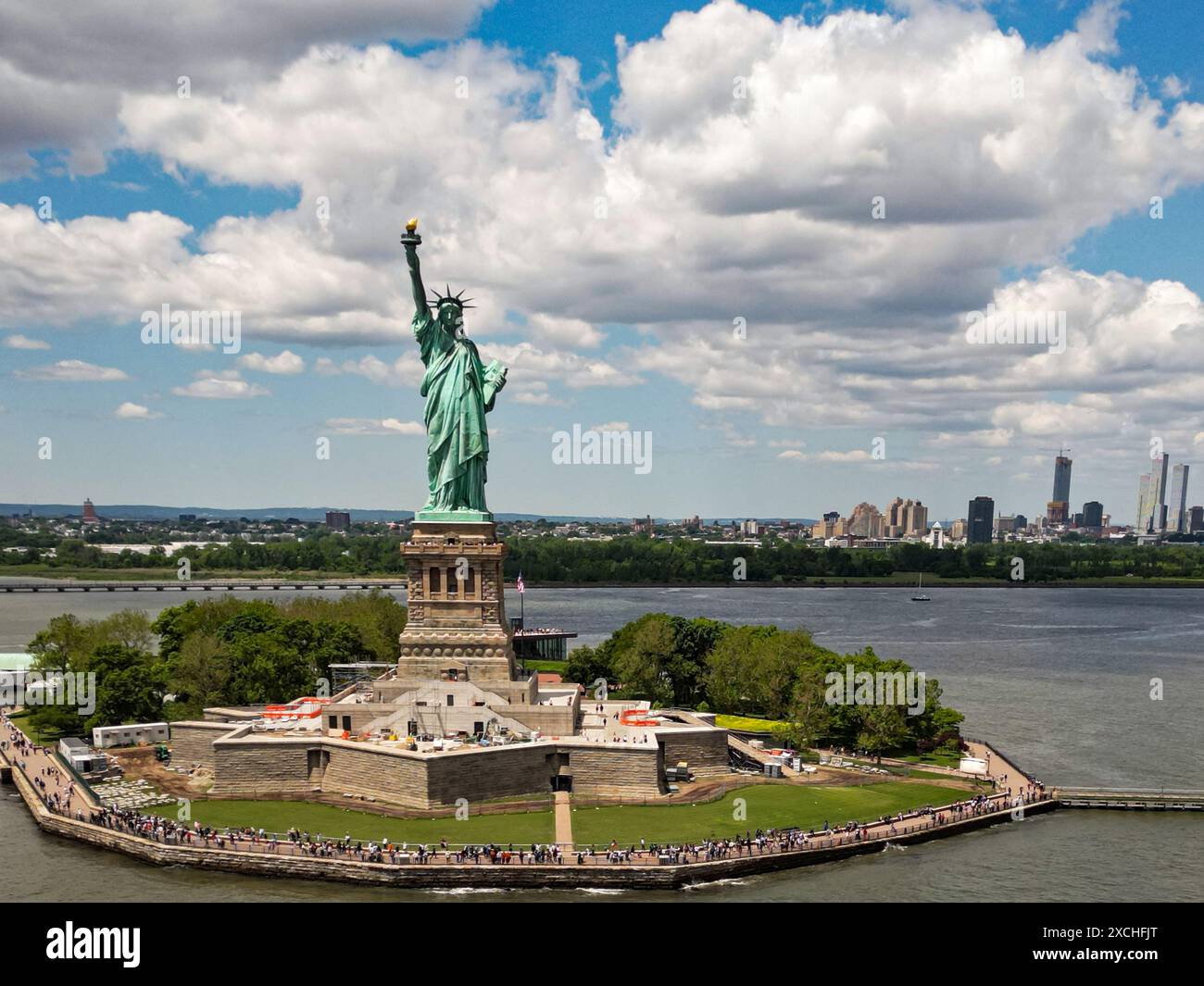 The Statue of Liberty over the Panorama of New York cityscape. New York ...