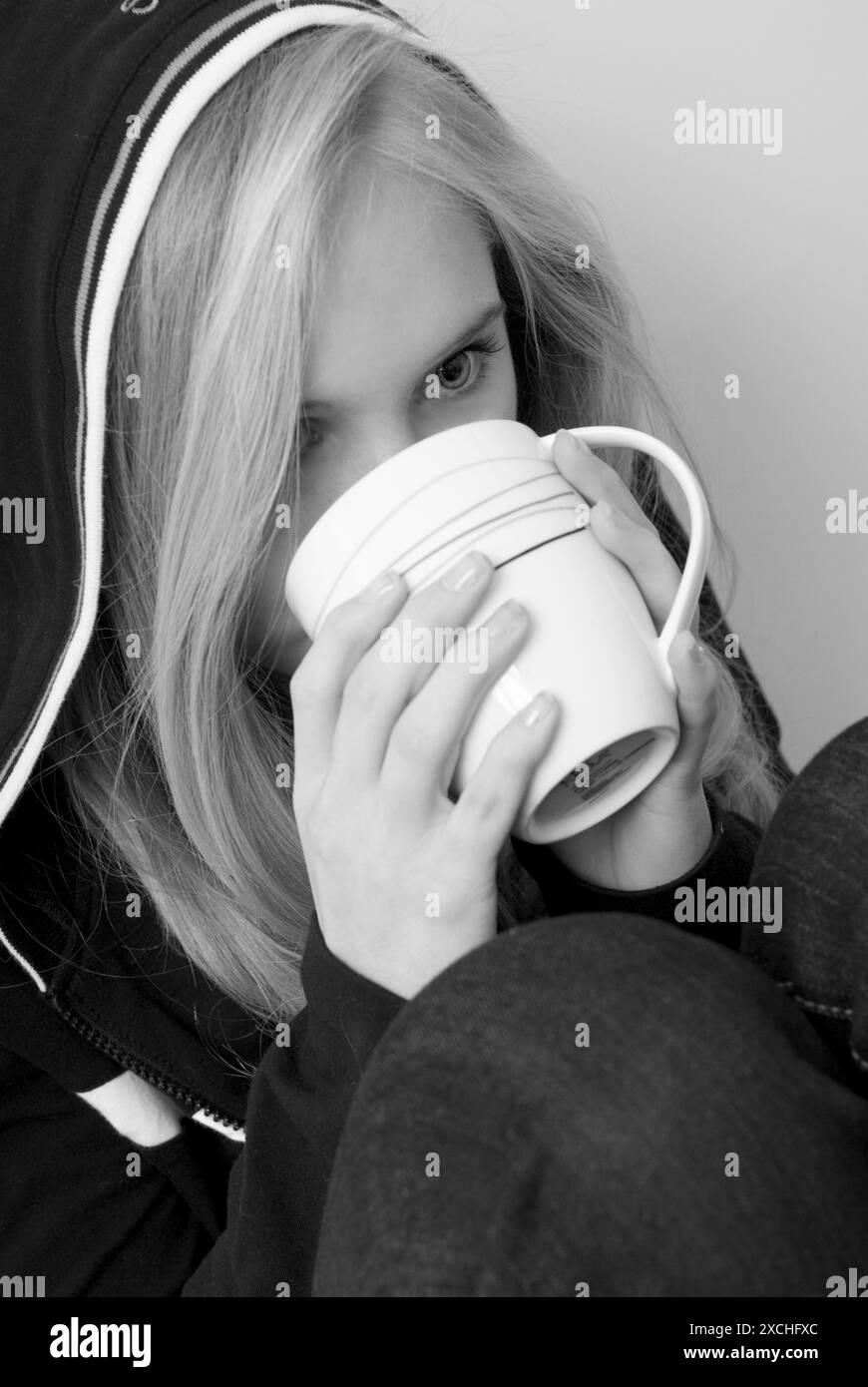 Teen female holding coffee cup hi-res stock photography and images - Alamy