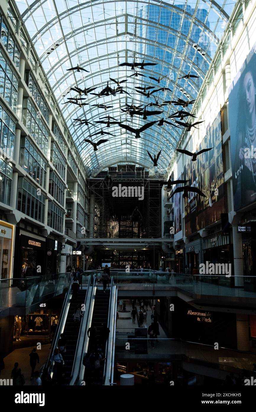 The big hall of the Toronto Eaton Centre shopping center in Toronto ...