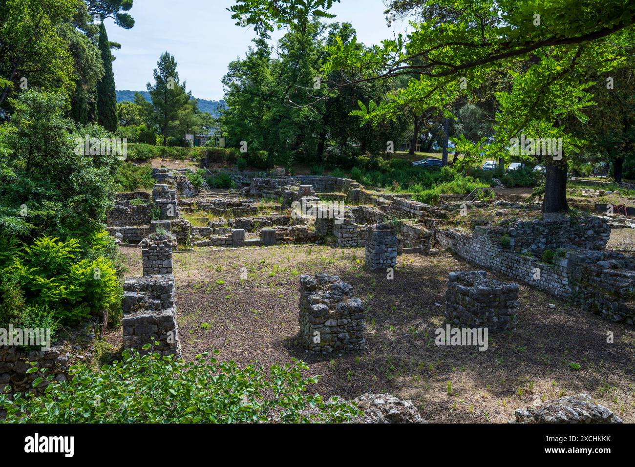 Ruins of medieval cathedral on Colline du Château (hilltop park) in old ...