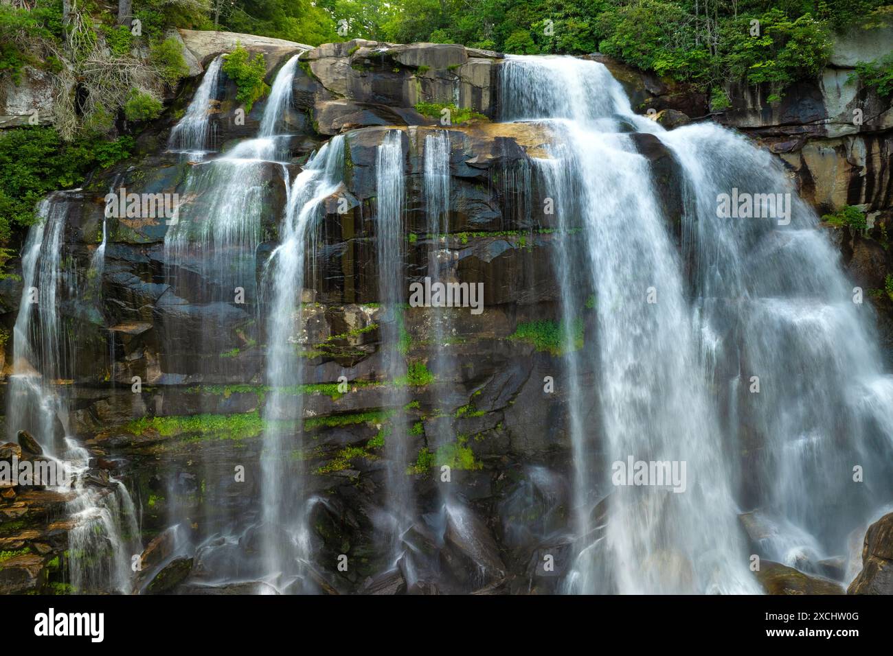 Beautiful landscape of high waterfall with falling down clear water ...