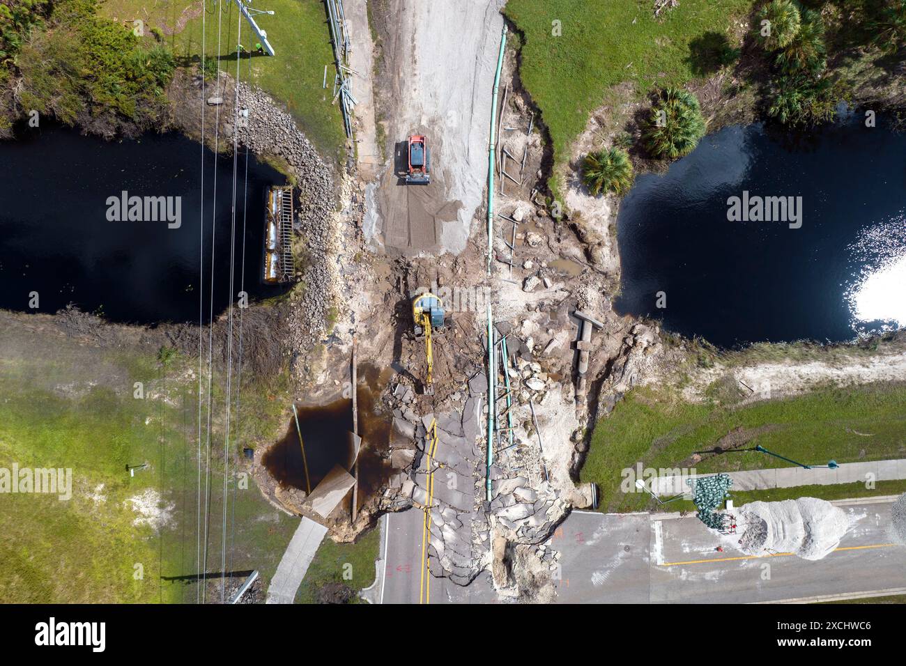 Construction equipment at roadworks site. Reconstruction of damaged ...