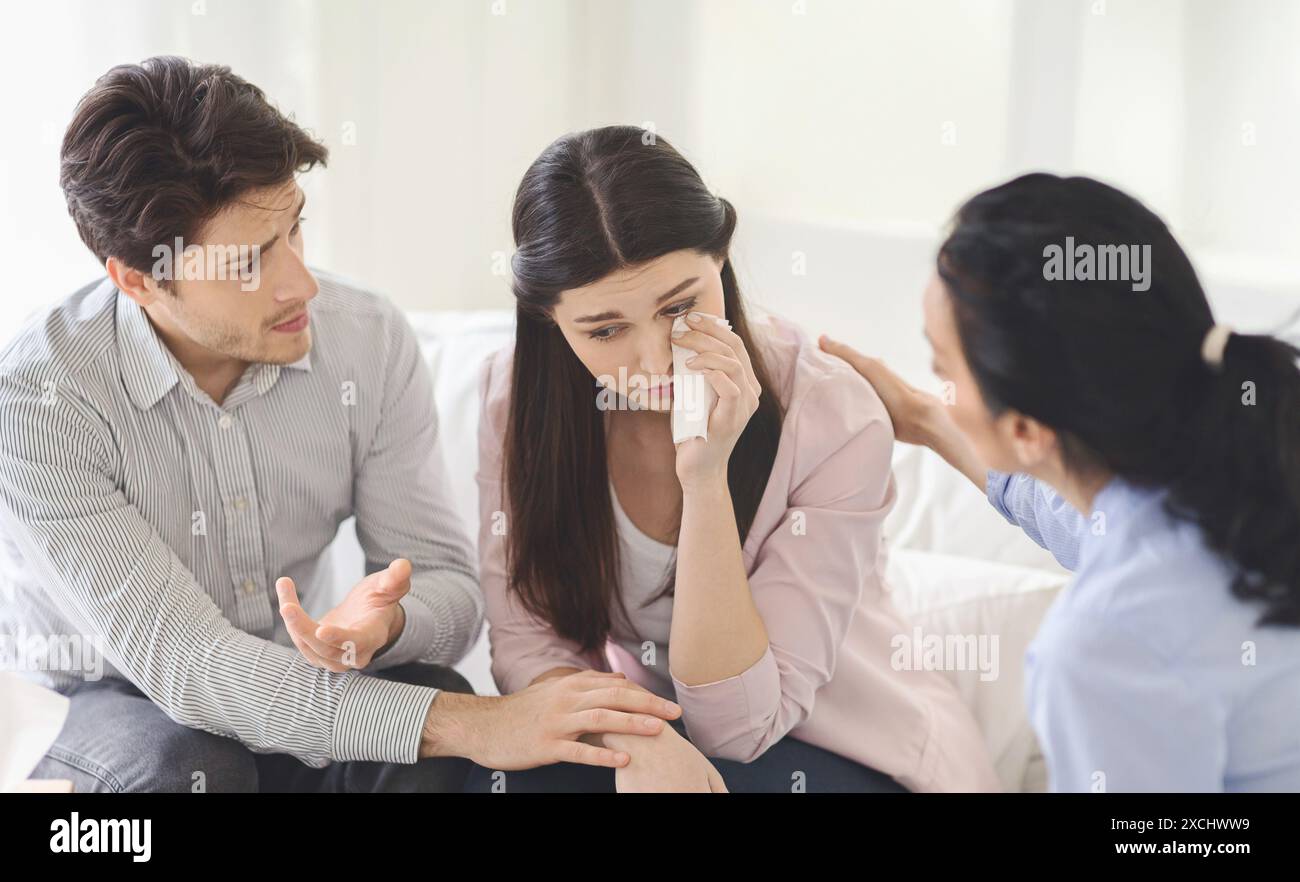 Friends helping crying hi-res stock photography and images - Alamy