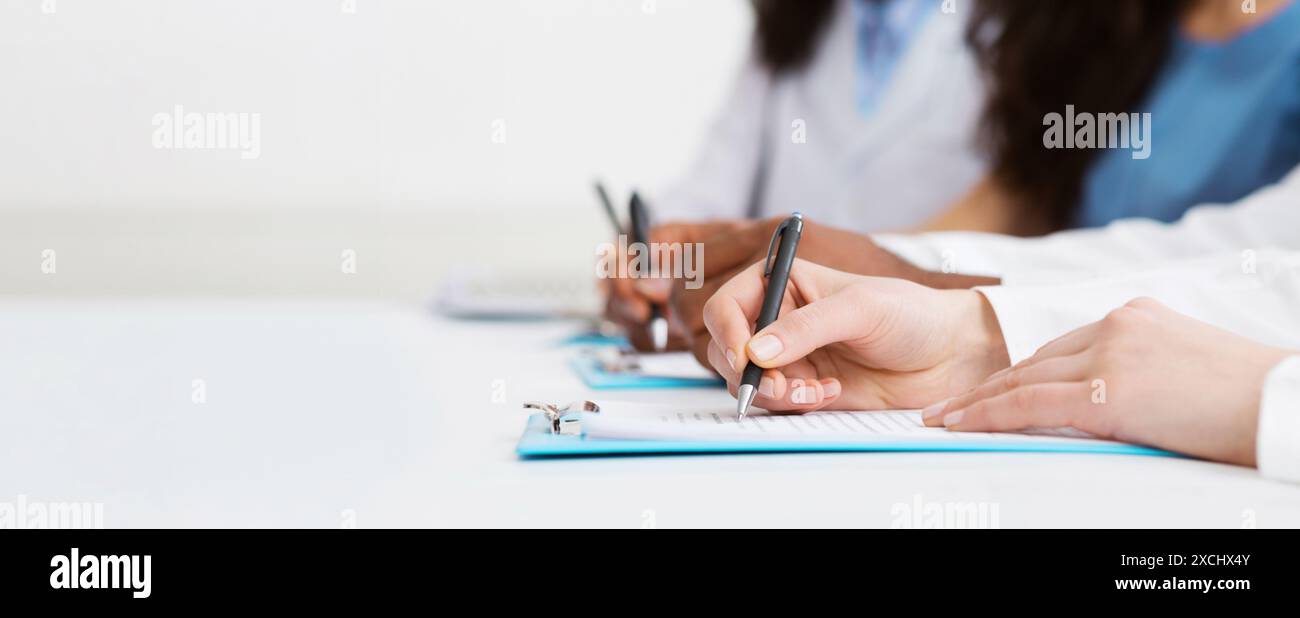 African doctor writing on paper hi-res stock photography and images - Alamy