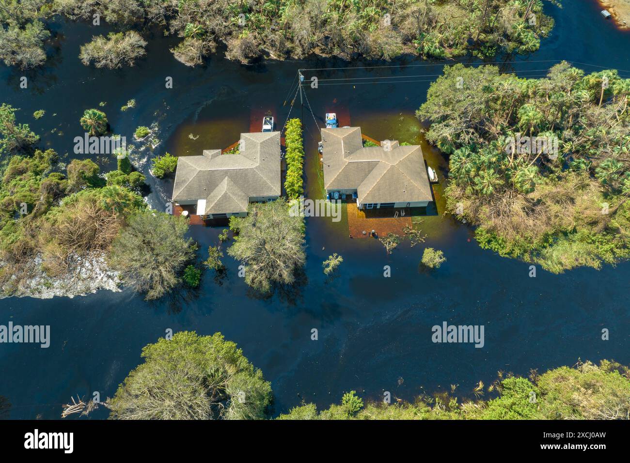 Surrounded by hurricane Ian rainfall flood waters homes in Florida ...