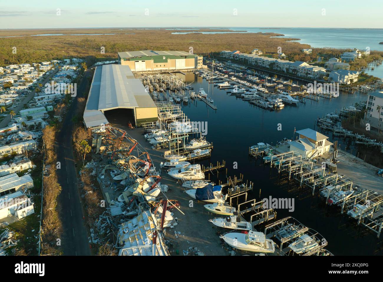 Warehouse with motorboats and yachts destroyed by hurricane winds in ...