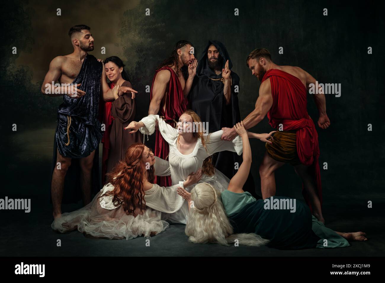 Redhaired woman in white dress surrounded by men and women in ancient ...