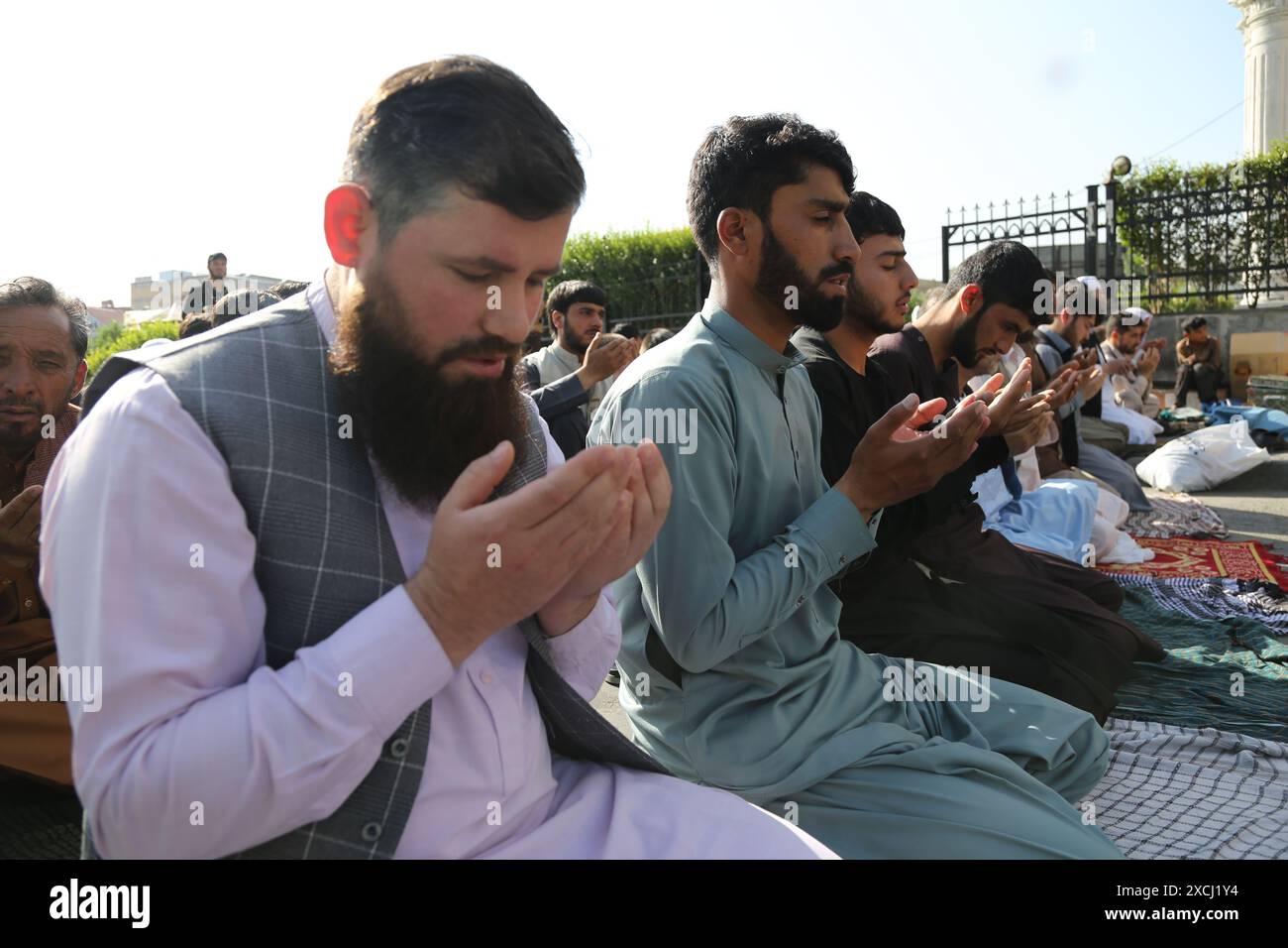 Kabul, Afghanistan. 17th June, 2024. Afghans pray for Eid al-Adha at a ...