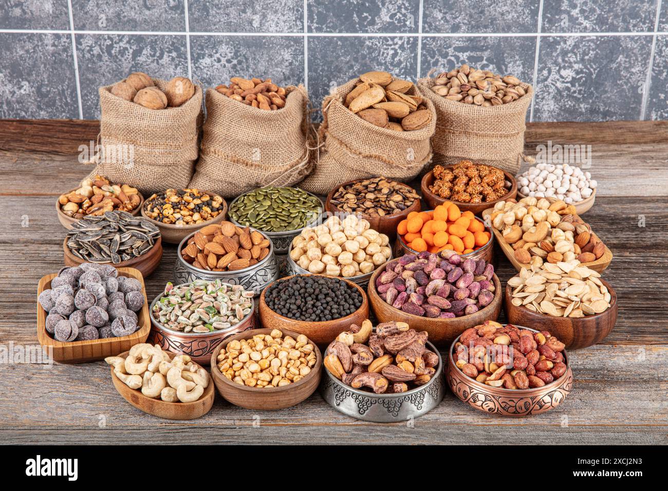 Assorted nuts and seeds background. mixed raw food for snacking, top ...