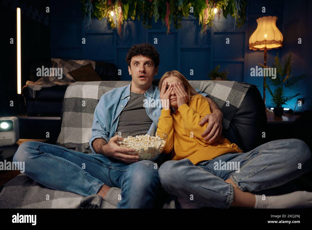 Family sitting at living room scared hi-res stock photography and ...