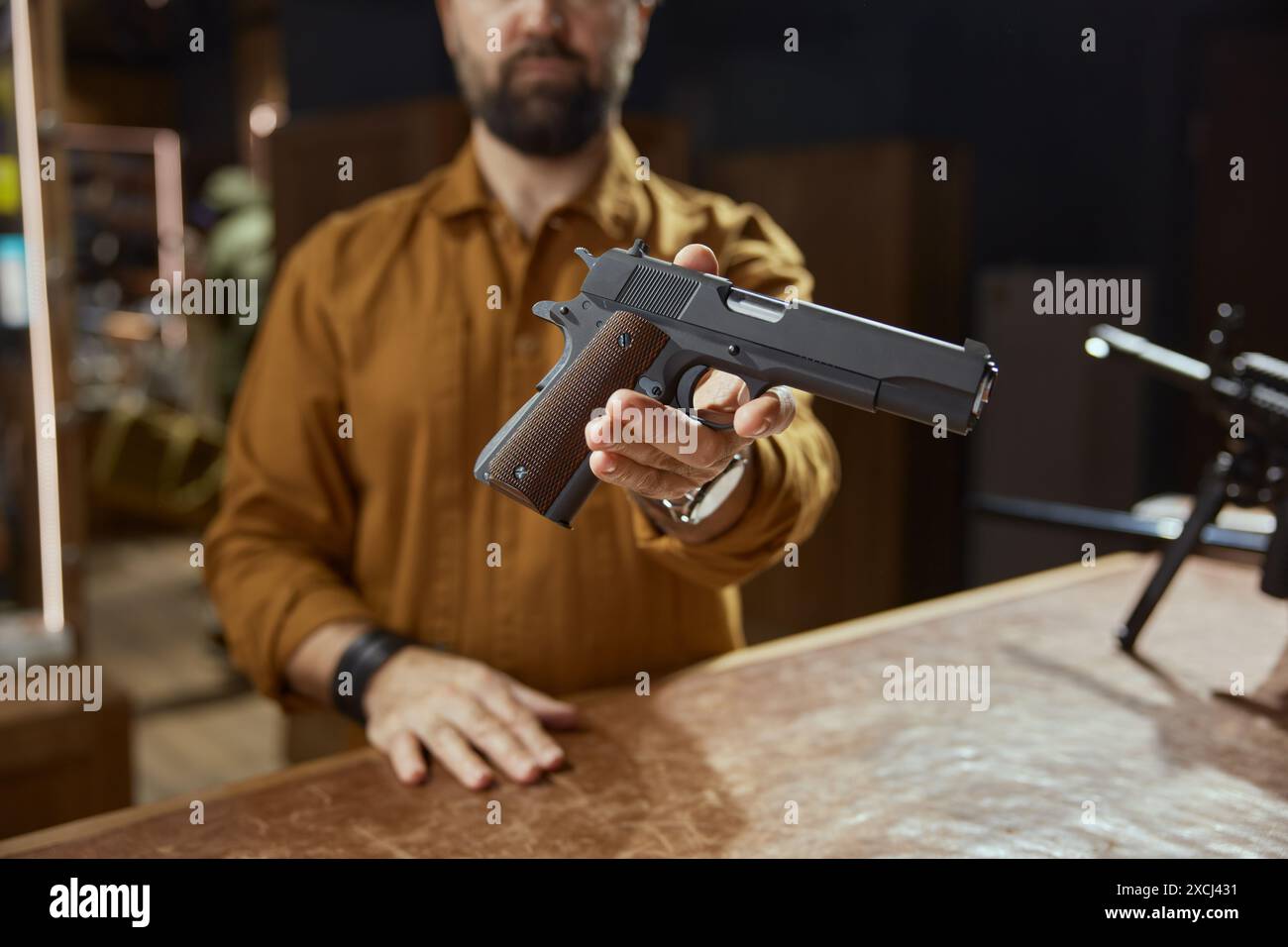Modern automatic handgun selling at stocks of weapons Stock Photo - Alamy